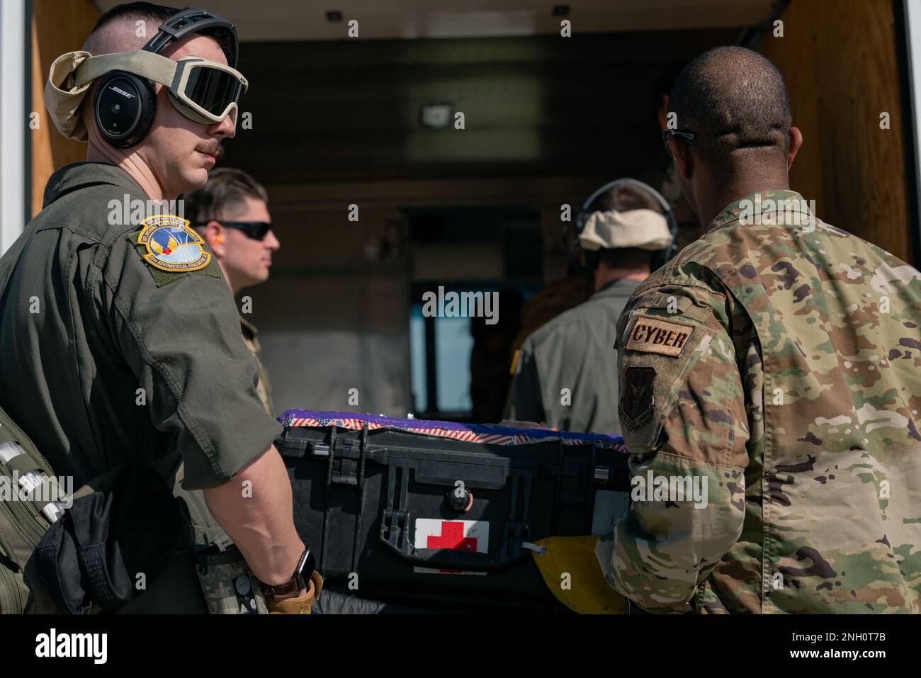 Airmen assigned to the 45th Aeromedical Evacuation Squadron load ...