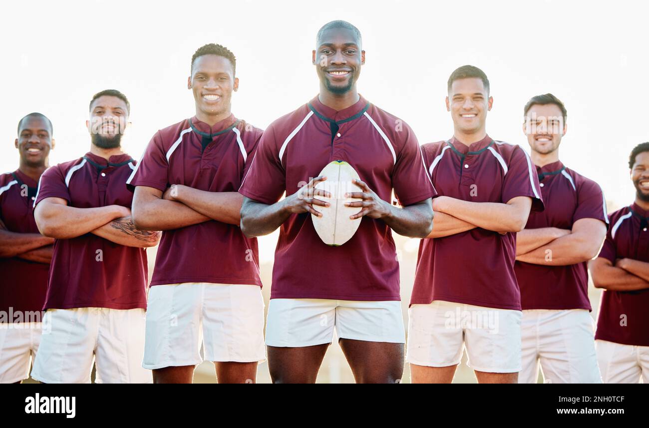 Rugby, field and portrait of team with ball and smile standing together ...