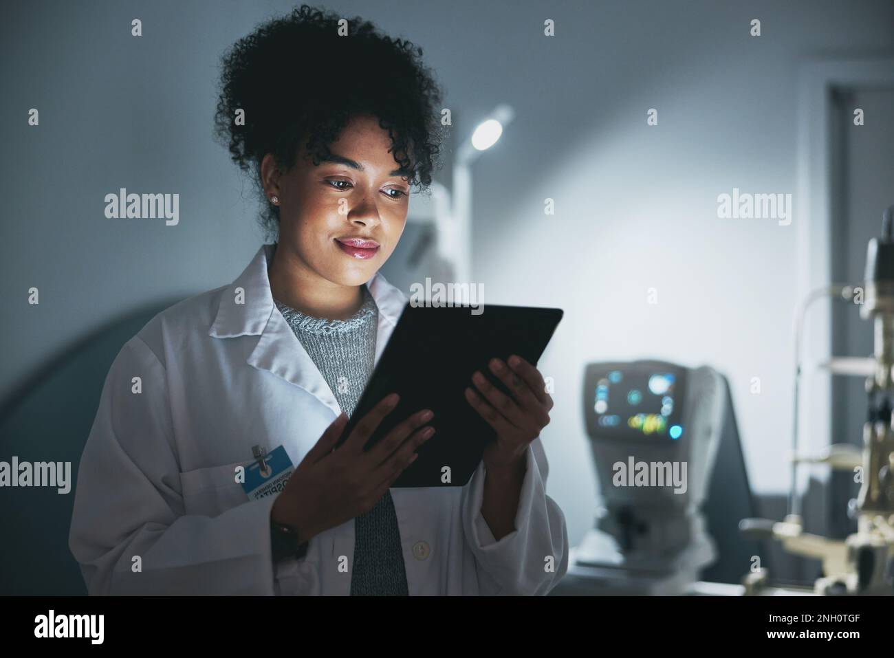 Medical doctor, tablet and black woman in hospital for online ...