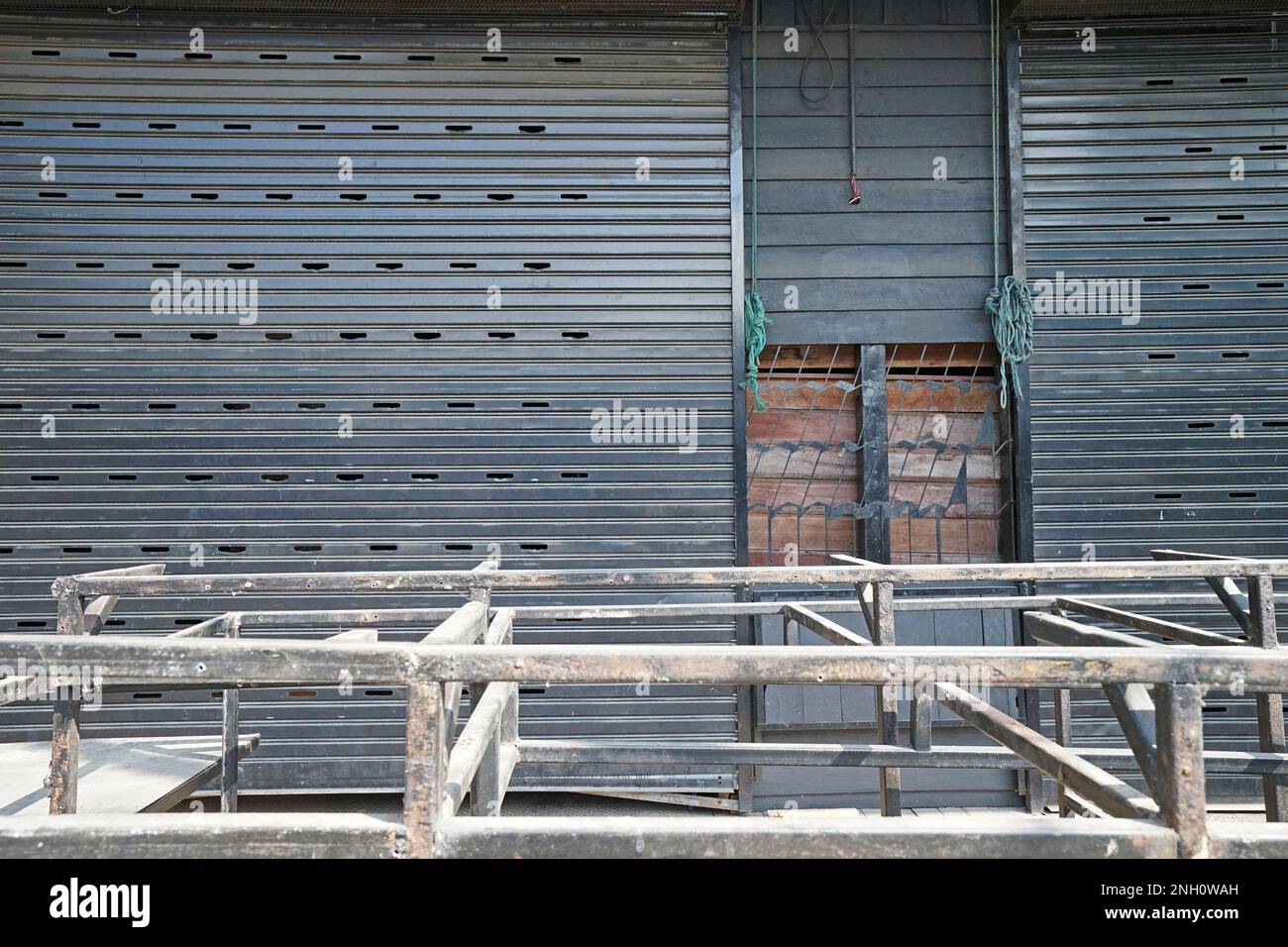 Detail of old steel metal shutter and folding door gate in Chinese ...