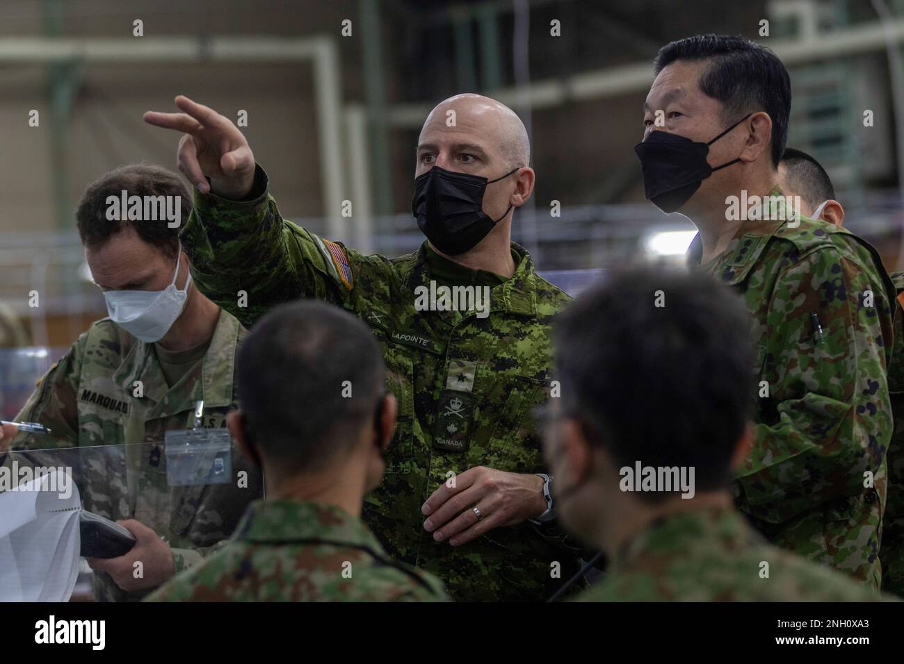 Soldiers assigned to 1st Brigade 11th Airborne Division work together ...