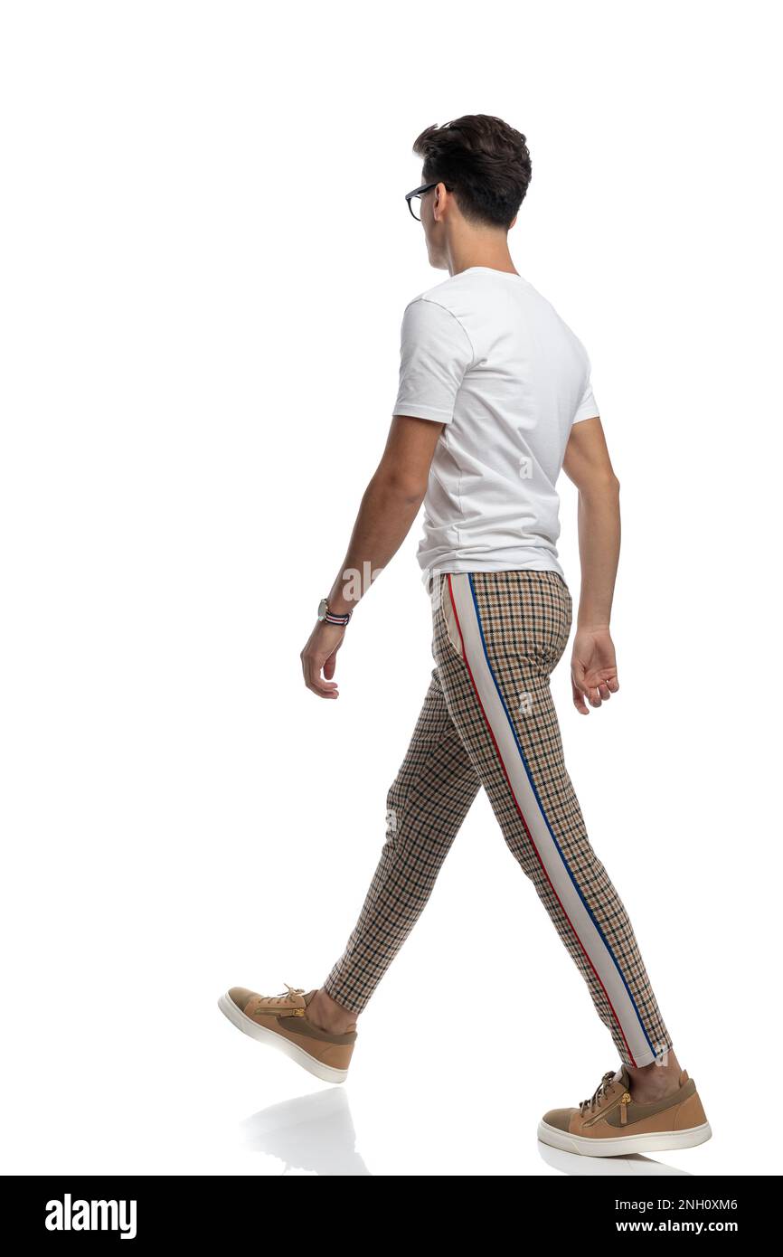back and side view of casual young man with white t-shirt and plaid ...