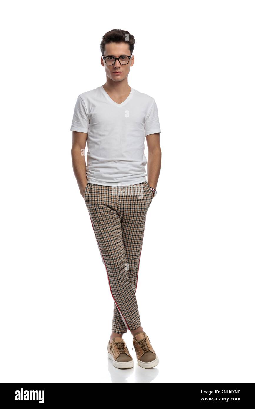 full body picture of confident casual guy holding hands in plaid pants ...