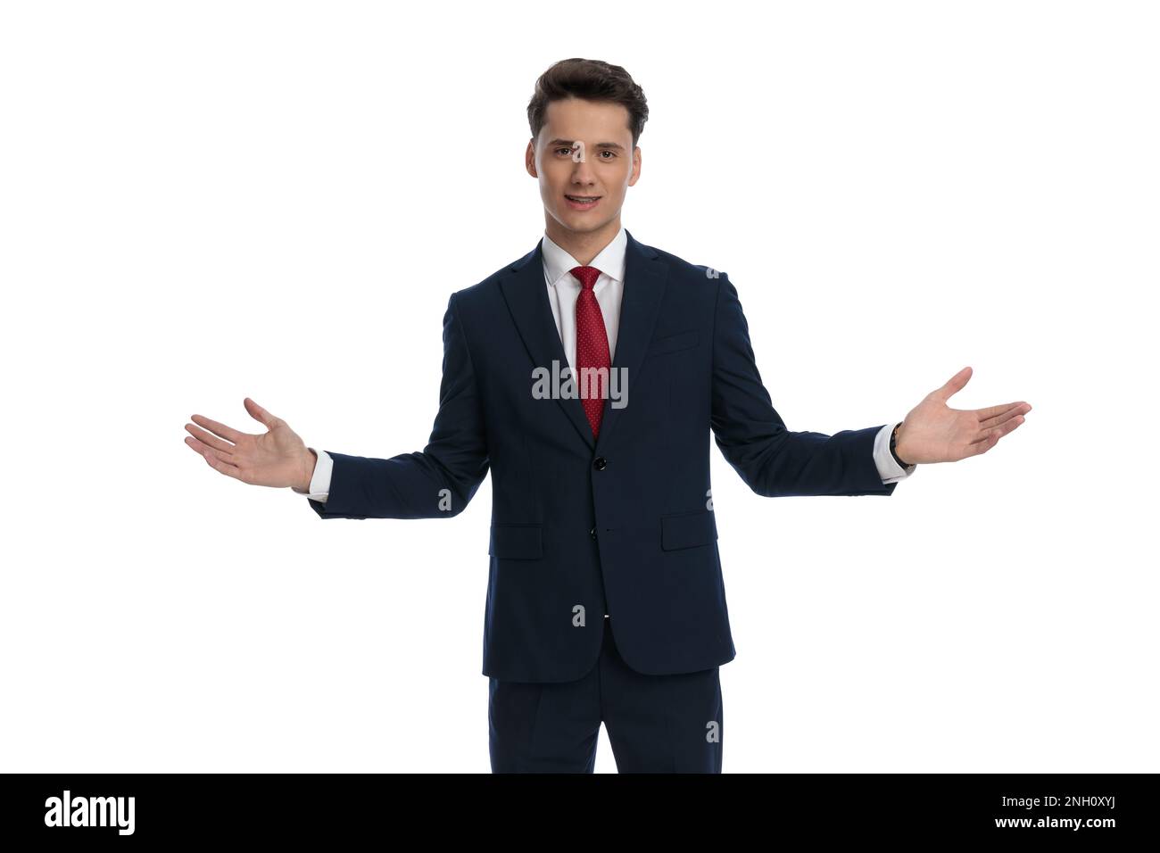 handsome businessman smiling with open arms, wearing a suit and tie ...