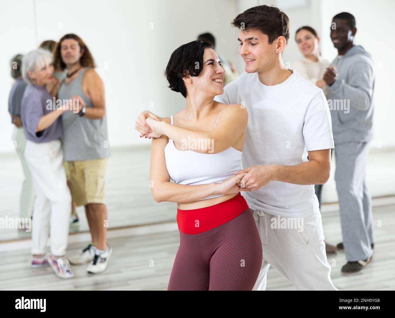 Cheerful people girl guy dancing hi-res stock photography and images ...