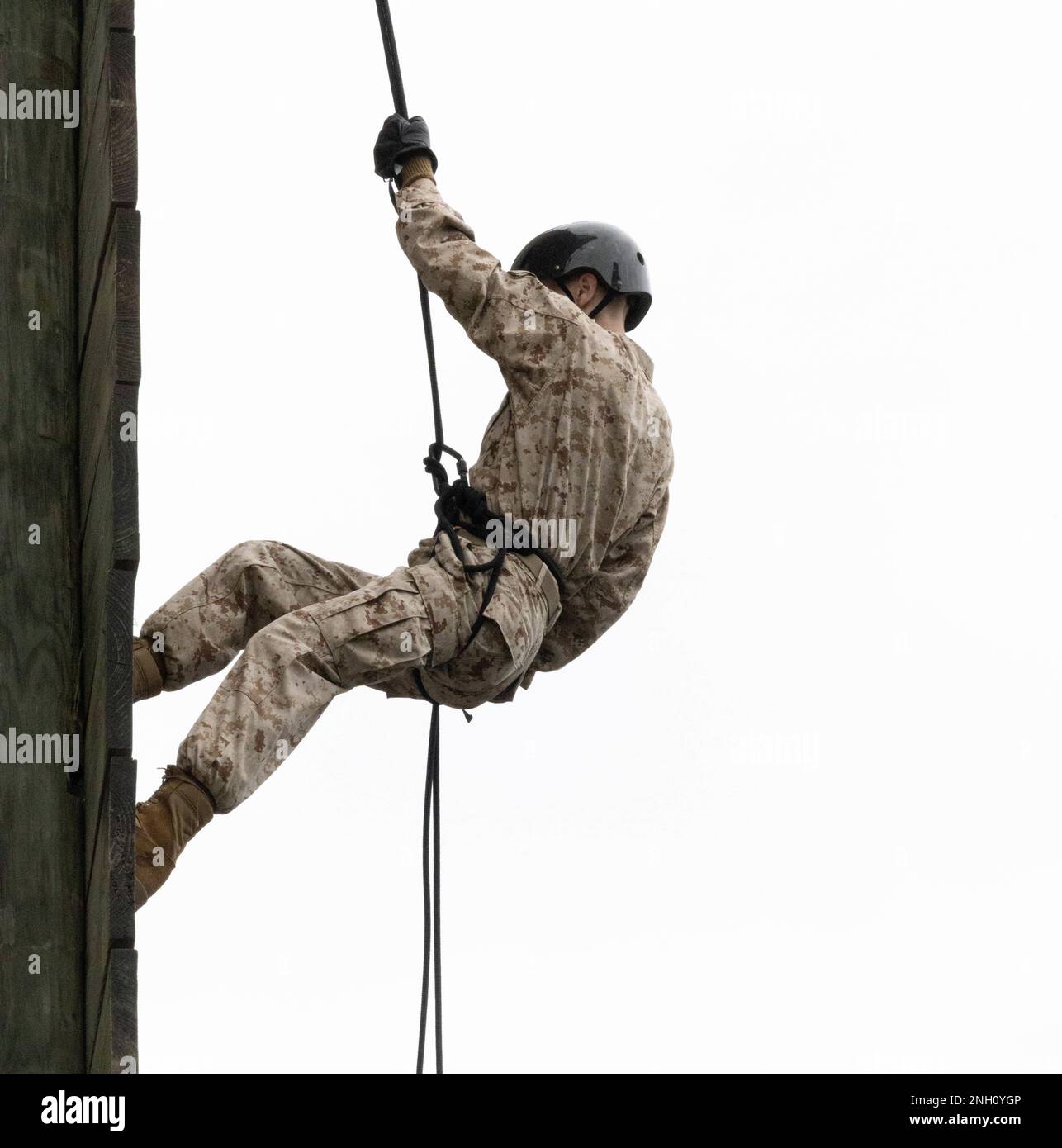 A recruit with Kilo Company, 3rd Recruit Training Battalion, goes down ...