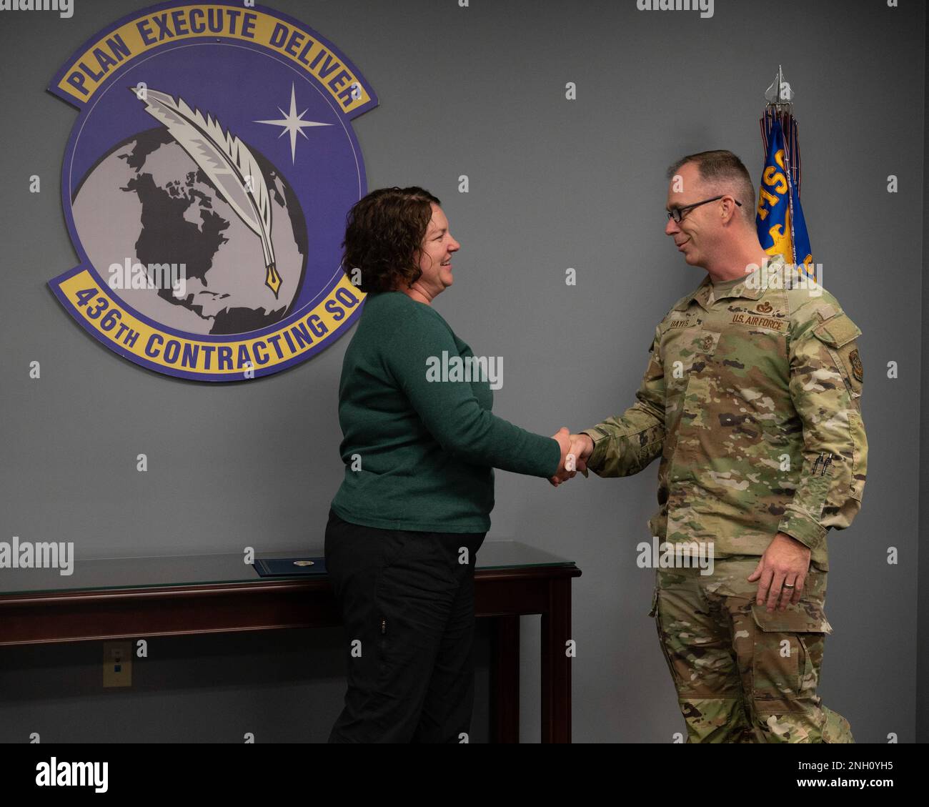 Chief Master Sgt. Timothy Bayes, right, 436th Airlift Wing command ...