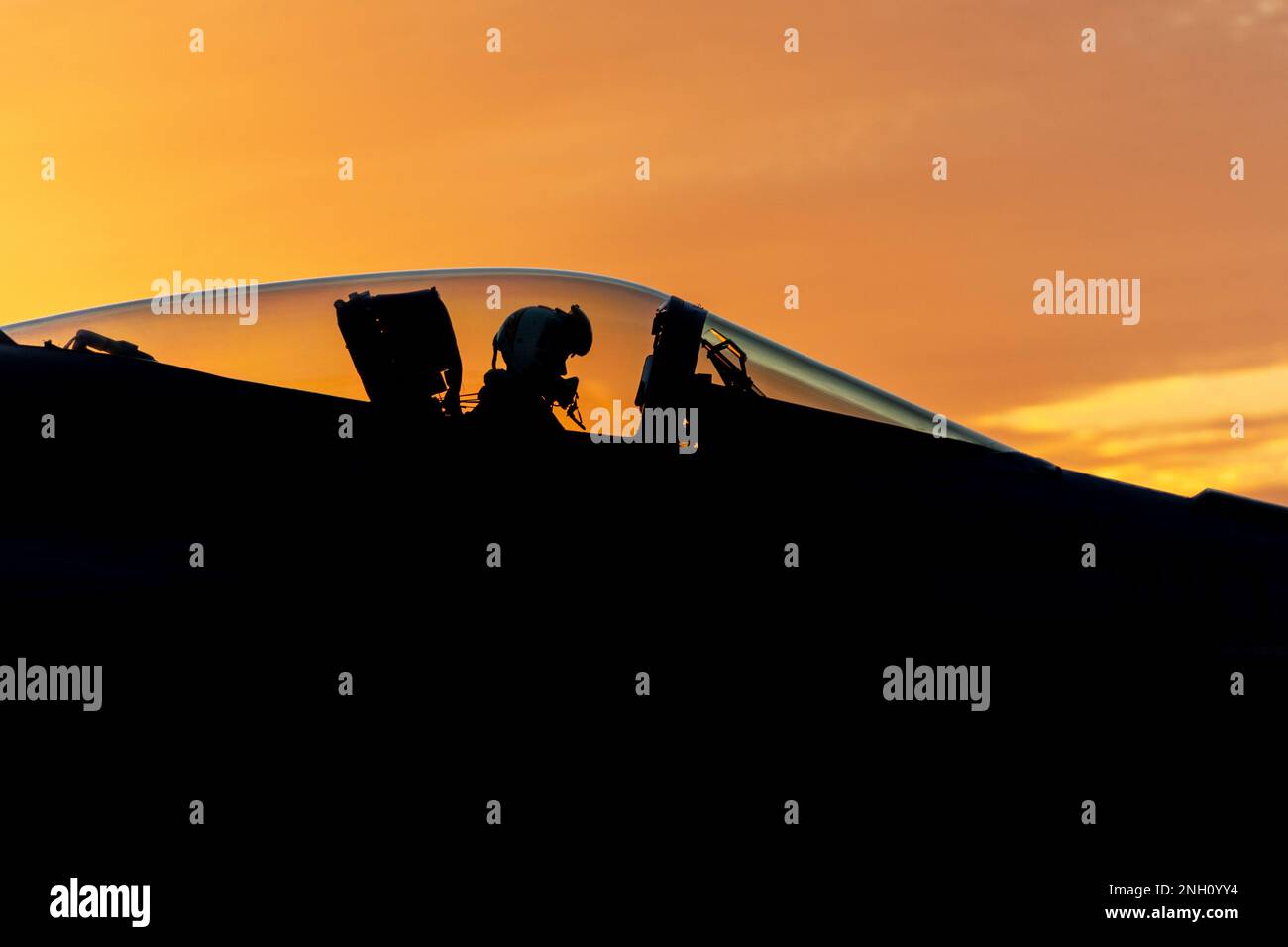 Lt. Andrew Dillard, from Orlando, Fla., prepares to launch an F/A-18E ...