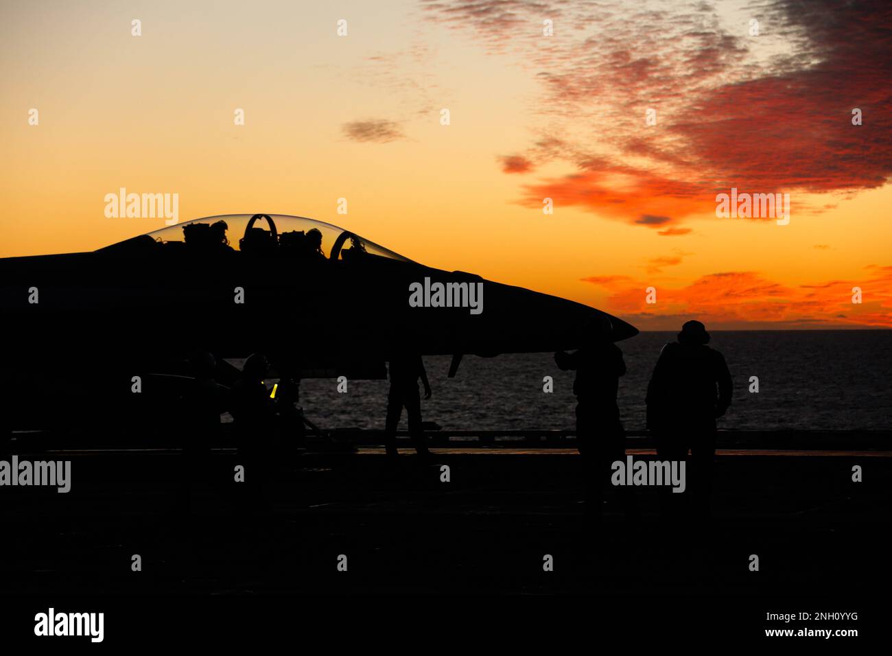 221205-N-IT121-1089 PACIFIC OCEAN (Dec. 5, 2022) Sailors prepare an F/A ...