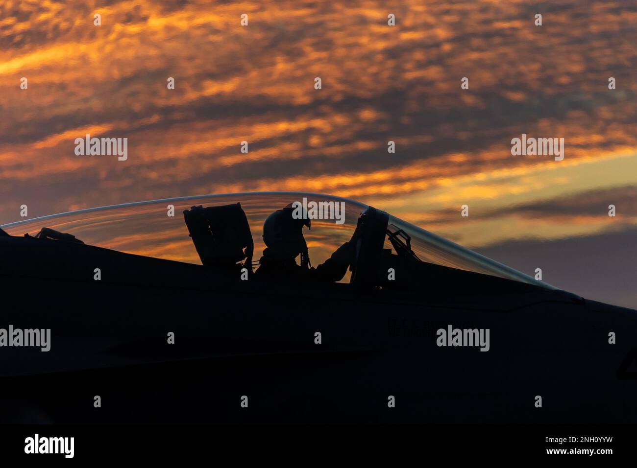 Lt. Andrew Dillard, from Orlando, Fla., prepares to launch an F/A-18E ...