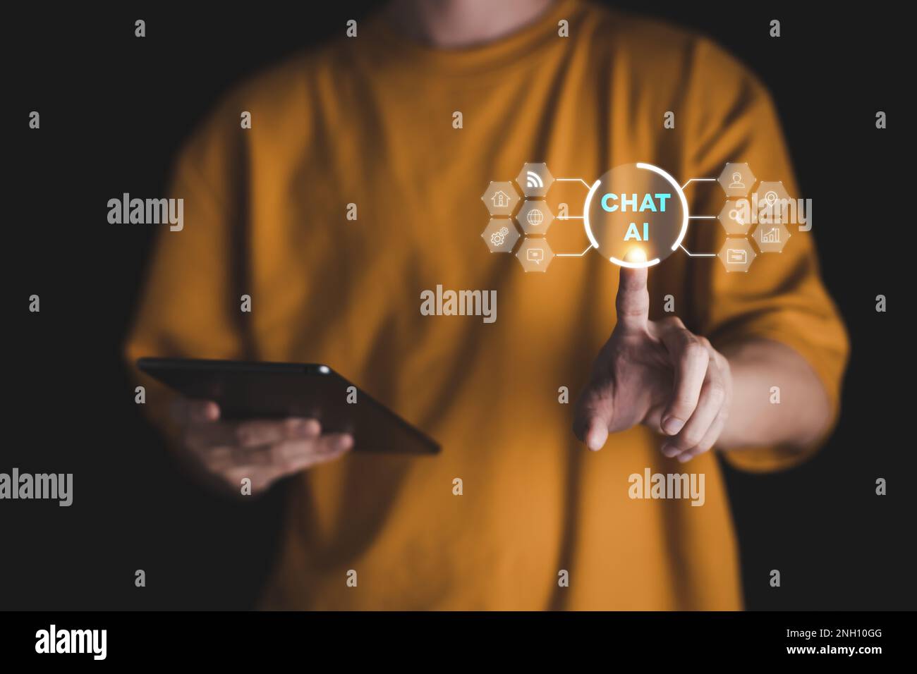 AI (Artificial intelligence), Chatbot growing concept. Businessman hand use tablet with ...