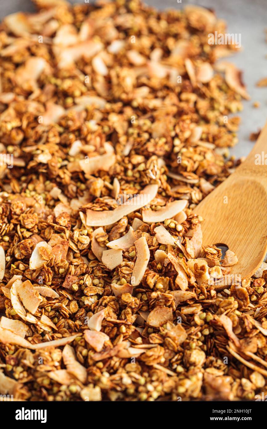 Homemade healthy granola with green buckwheat, coconut flakes, oatmeal ...