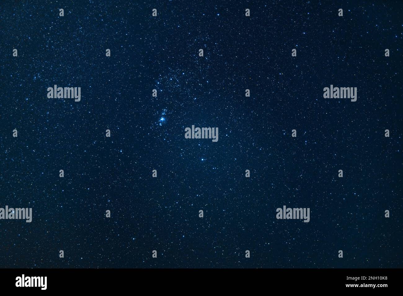 A night sky filled with stars gleaming against the dark backdrop of the ...