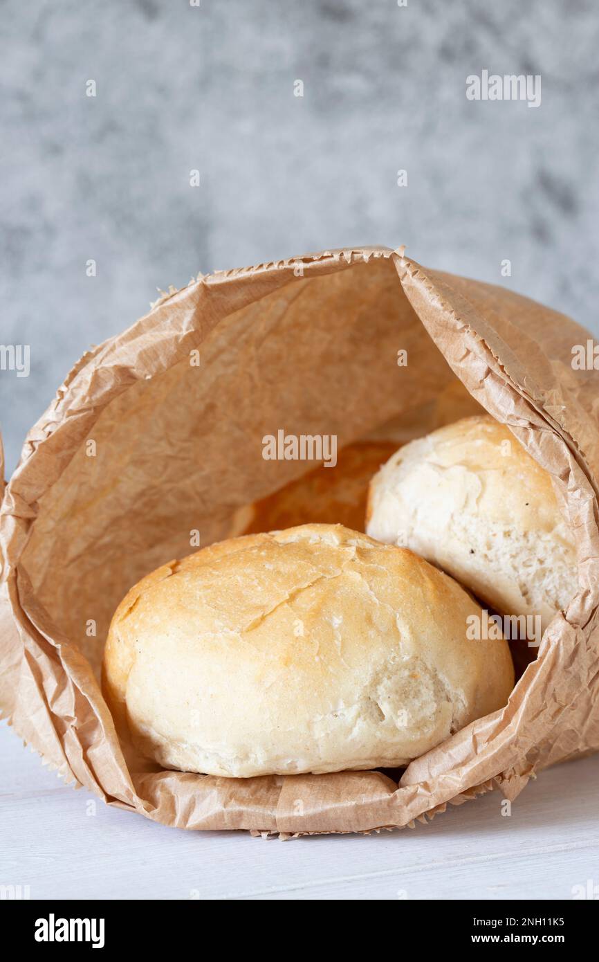 Bread roll buns in a brown paper bag. Eco friendly recycle disposable ...