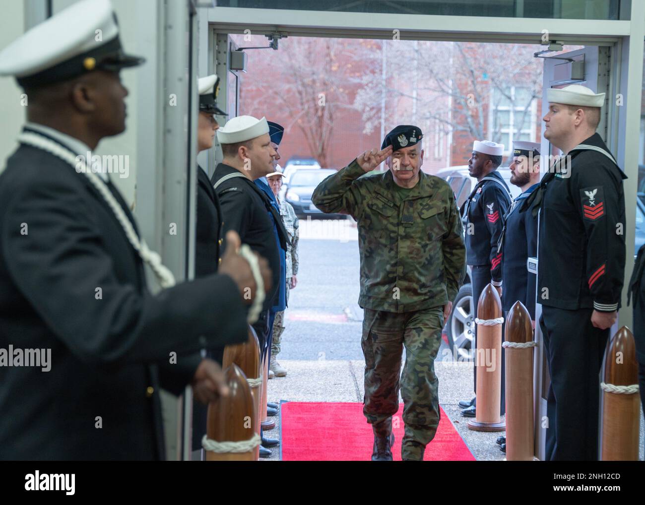 NORFOLK – Polish Army Lt. Gen. Janusz Adamczak walks through sideboys ...