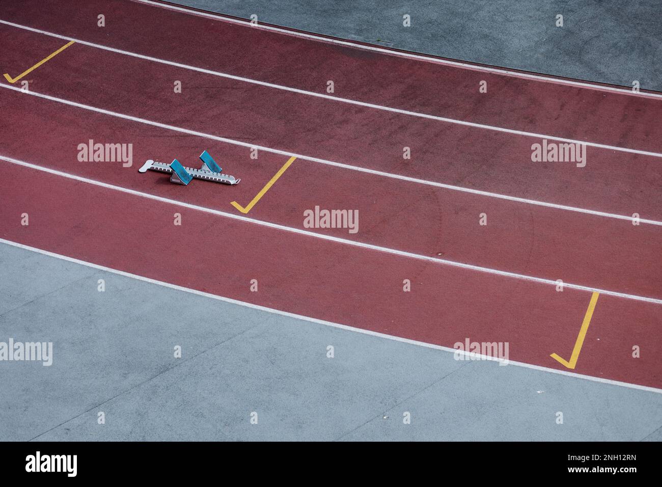 Running track in the stadium. Rubber coating. Athletics starting blocks ...