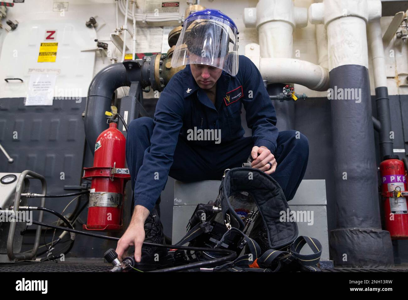 221206-N-CM110-1087 PACIFIC OCEAN (Dec. 6, 2022) – Damage Controlman ...