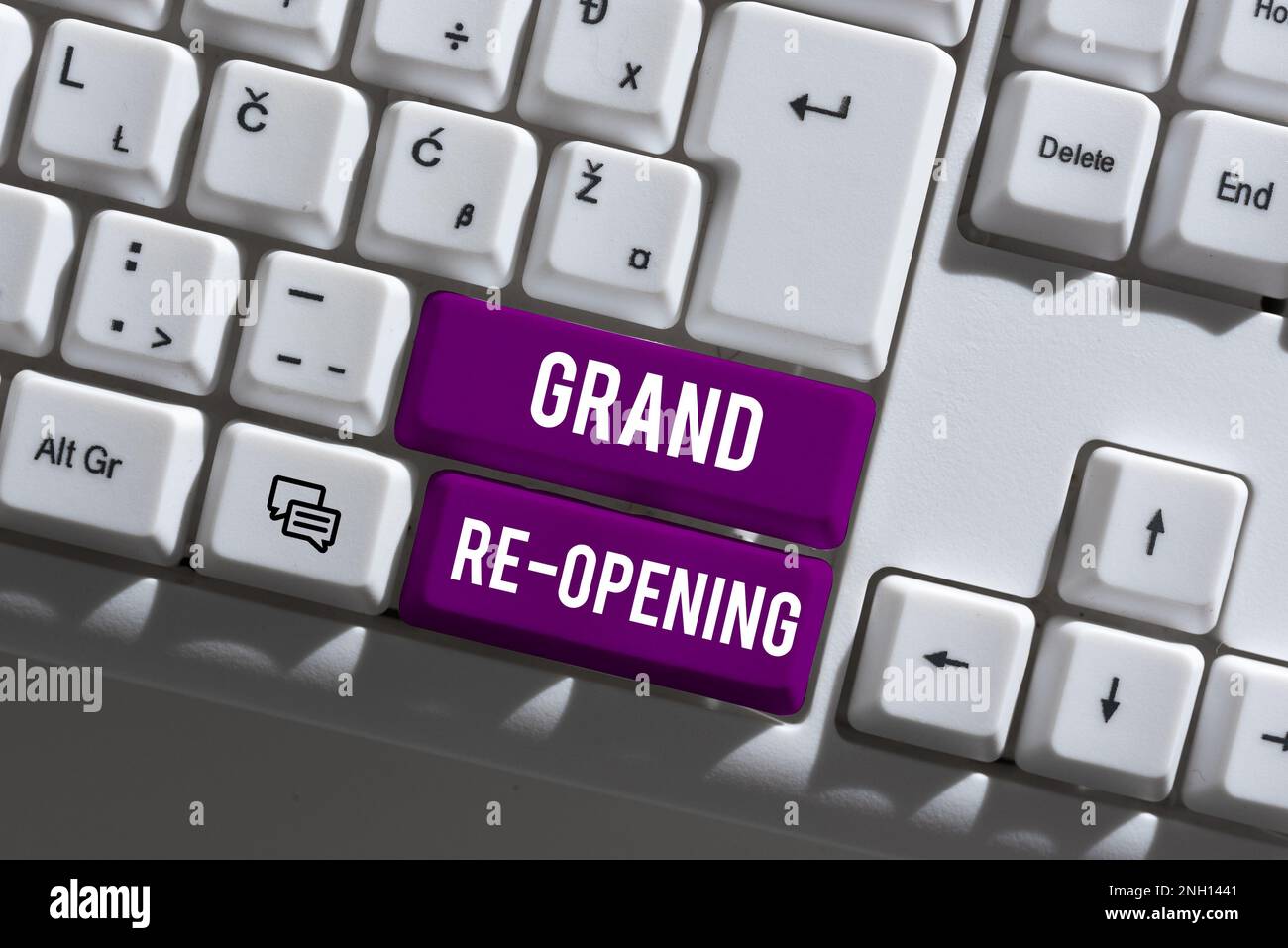 Sign displaying Grand Re Opening, Business approach held to mark the ...