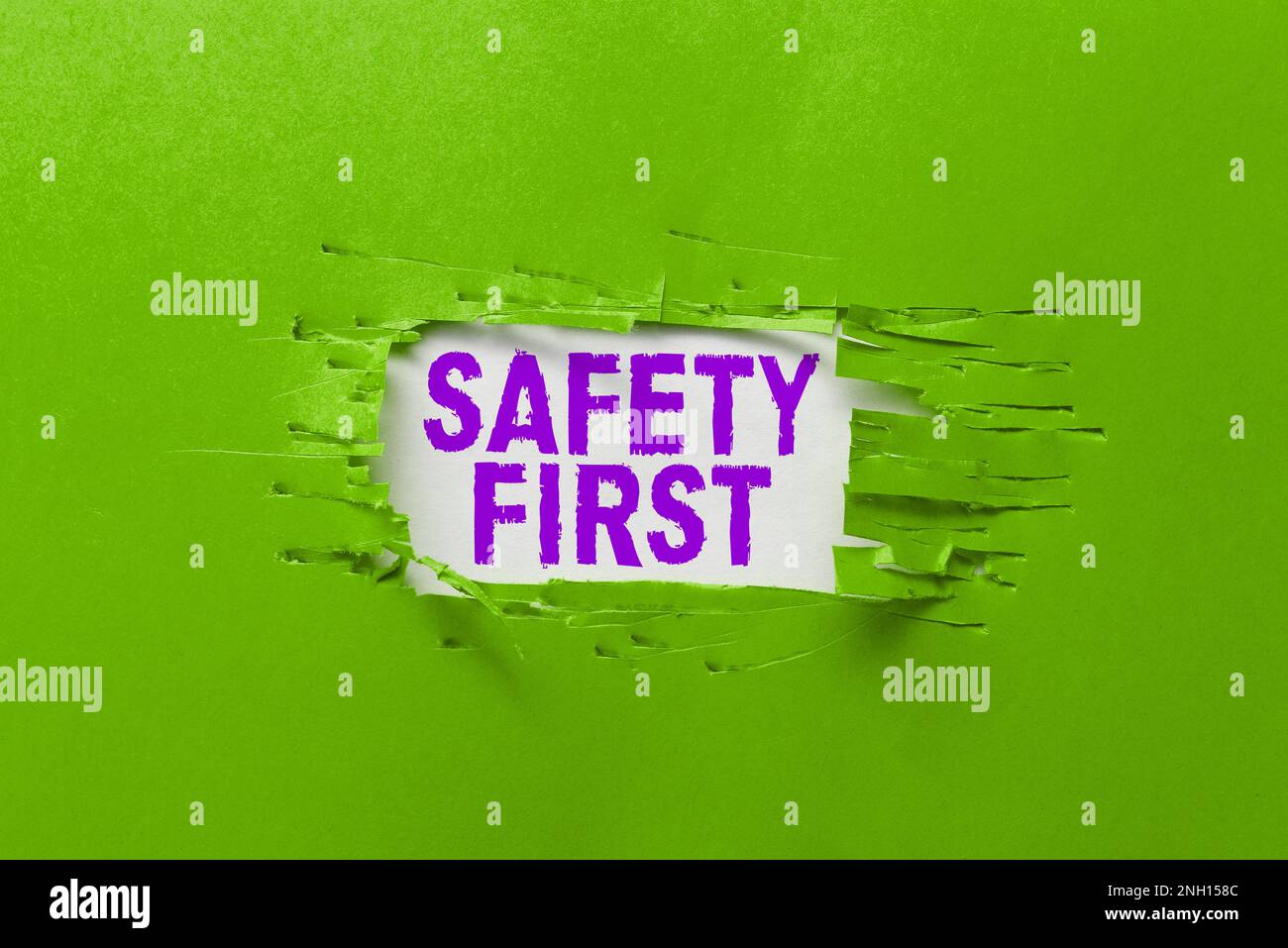 Hand writing sign Safety First, Business approach Avoid any unnecessary ...