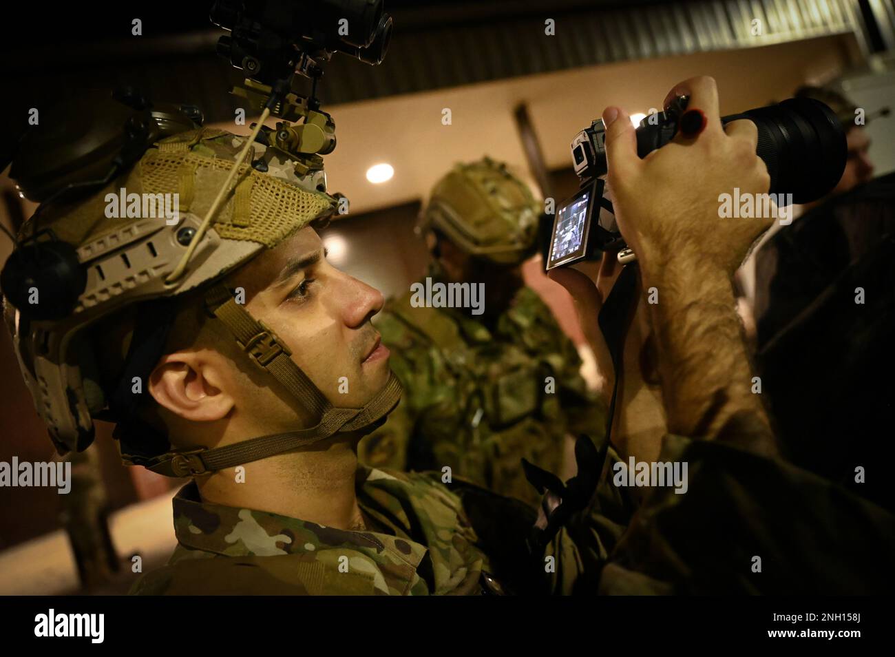 U.S. Air Force Staff Sgt. Enrique Barcelo, 1st Combat Camera Squadron combat camera craftsman ...