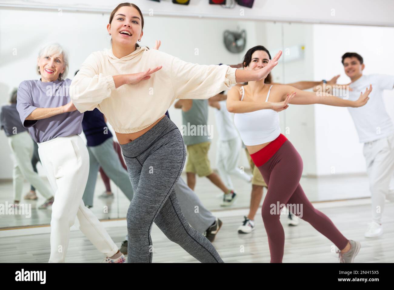 Group of adult people practices dance aerobics Stock Photo - Alamy