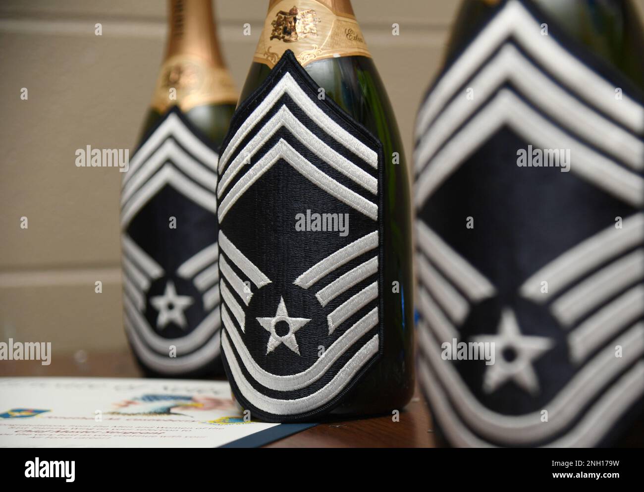 Bottles of champagne are displayed during the chief master sergeant ...