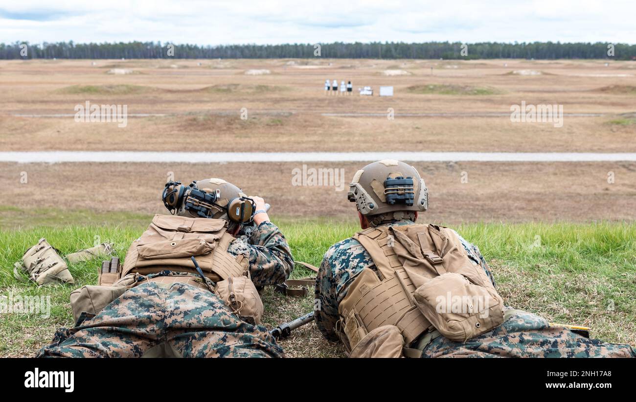 U.S. Marines with 2d Regiment, 2d Marine Division, sight in on a target ...