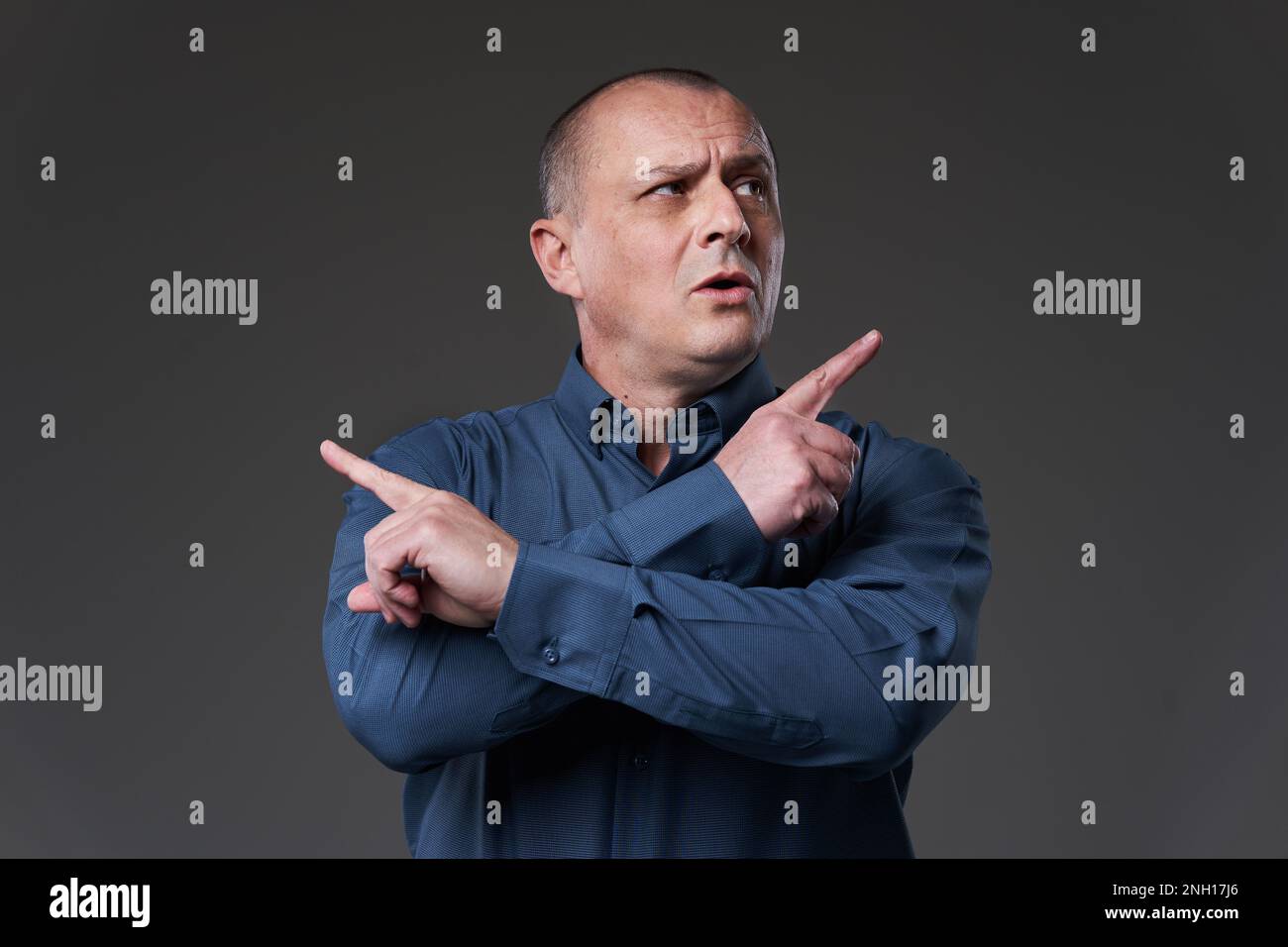 Closeup portrait of a confused businessman unsure about which direction ...