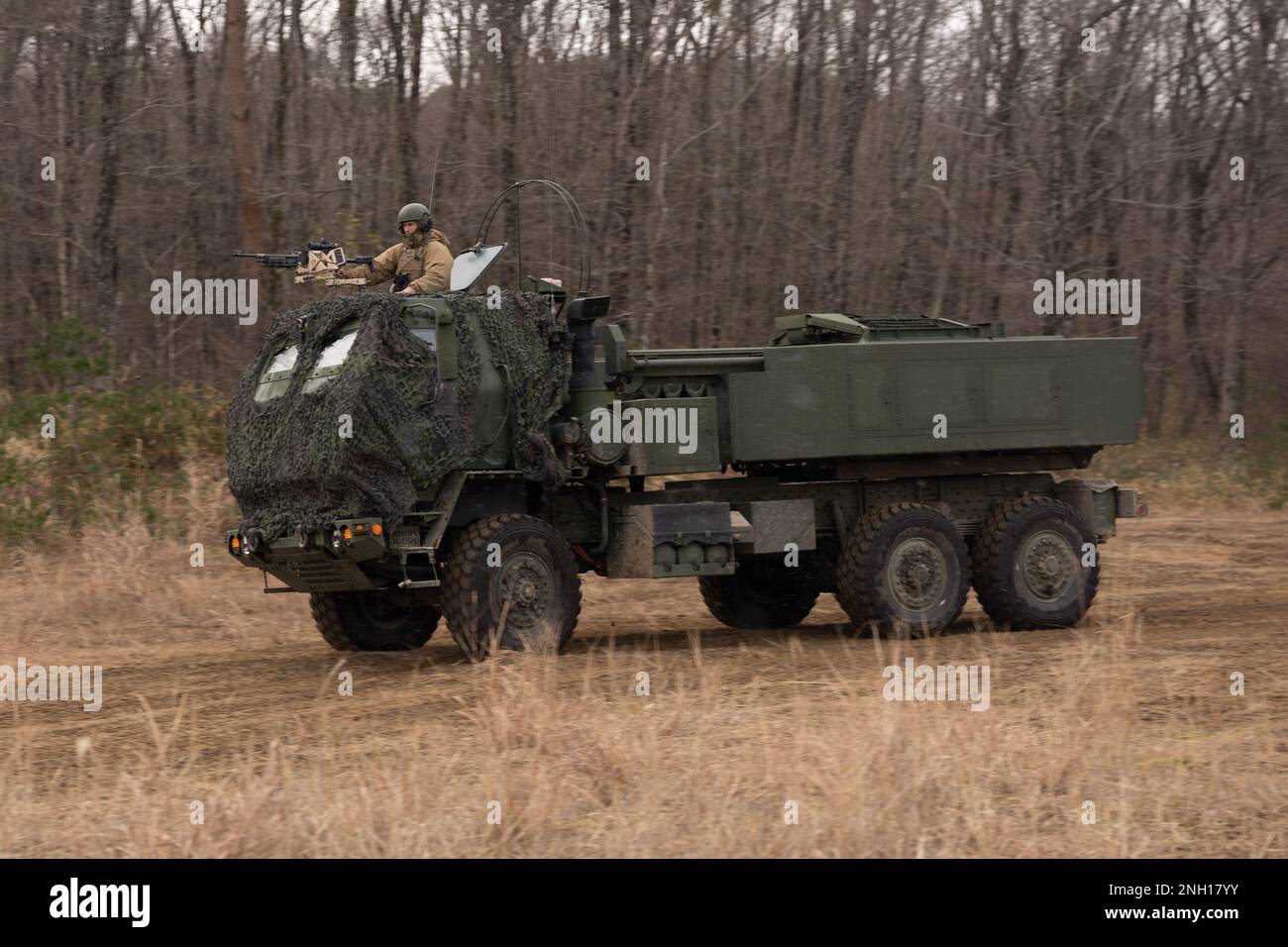 U.S. Marines with 3d Battalion, 12th Marines execute a simulated fire ...