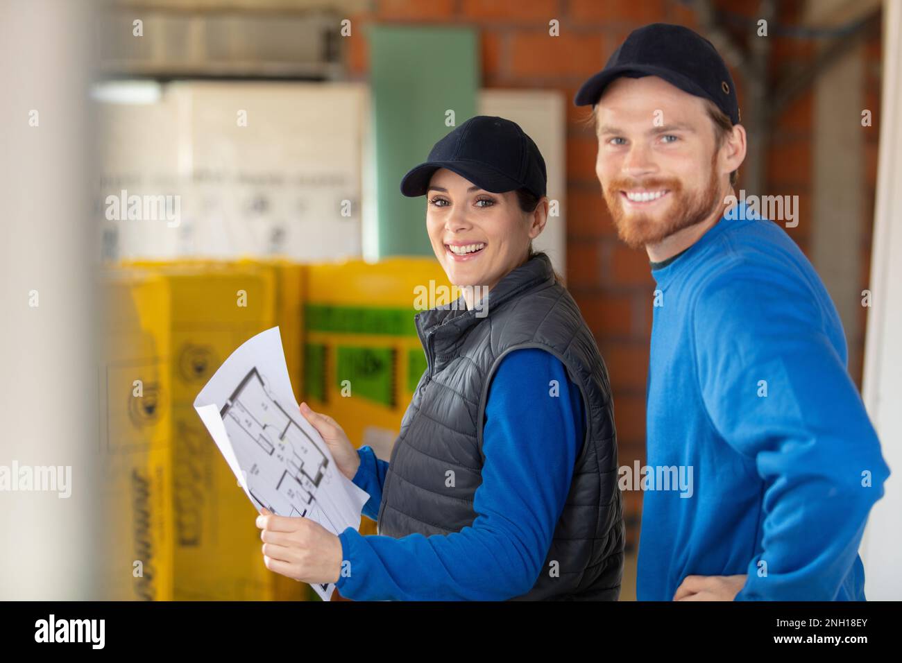 male and female construction workers Stock Photo - Alamy