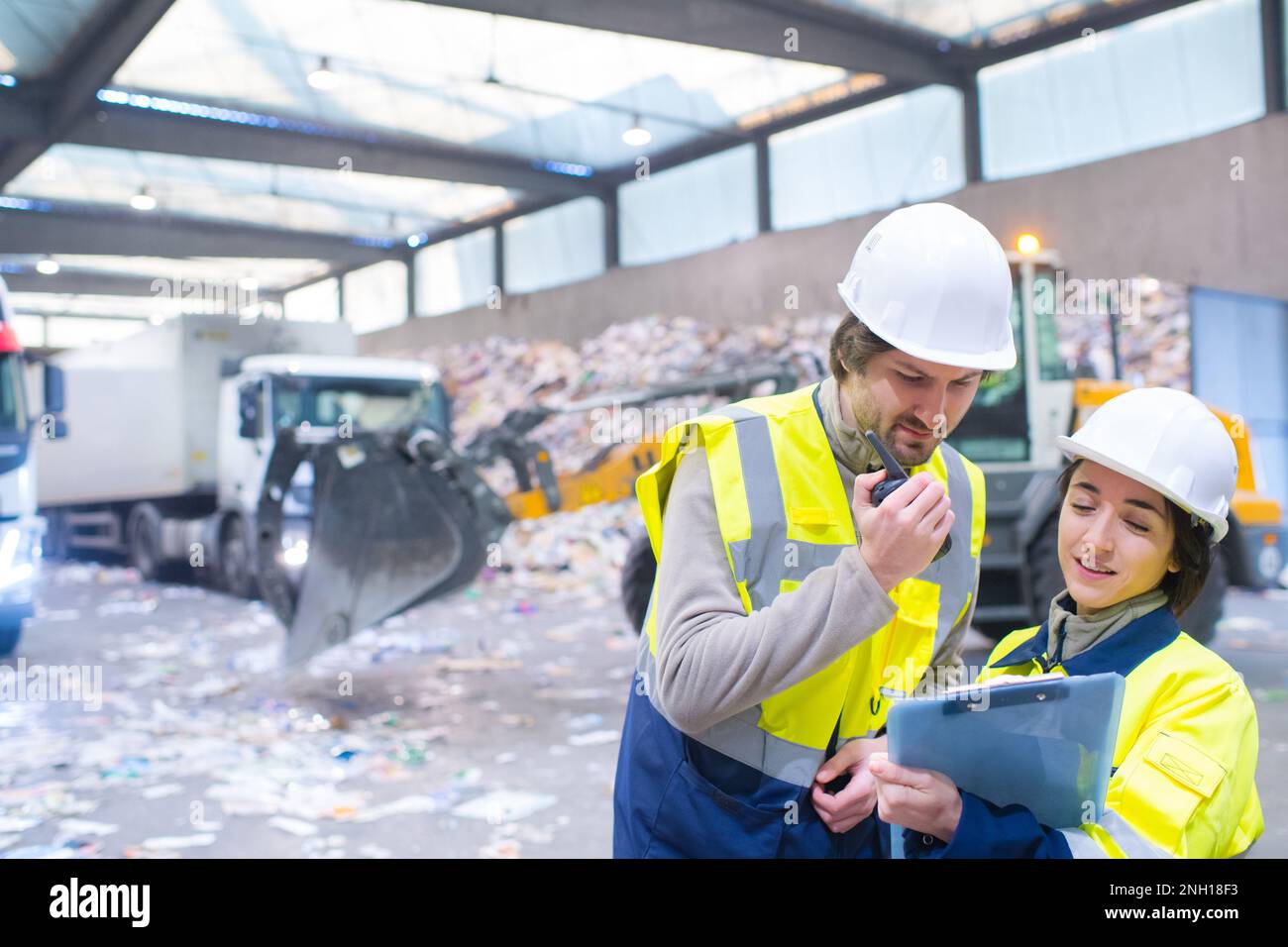 industrial engineers working in recycling plant with tablet Stock Photo ...
