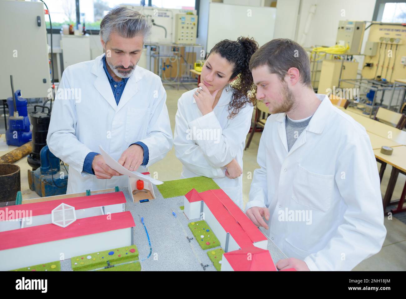future civil engineers studying the project Stock Photo - Alamy