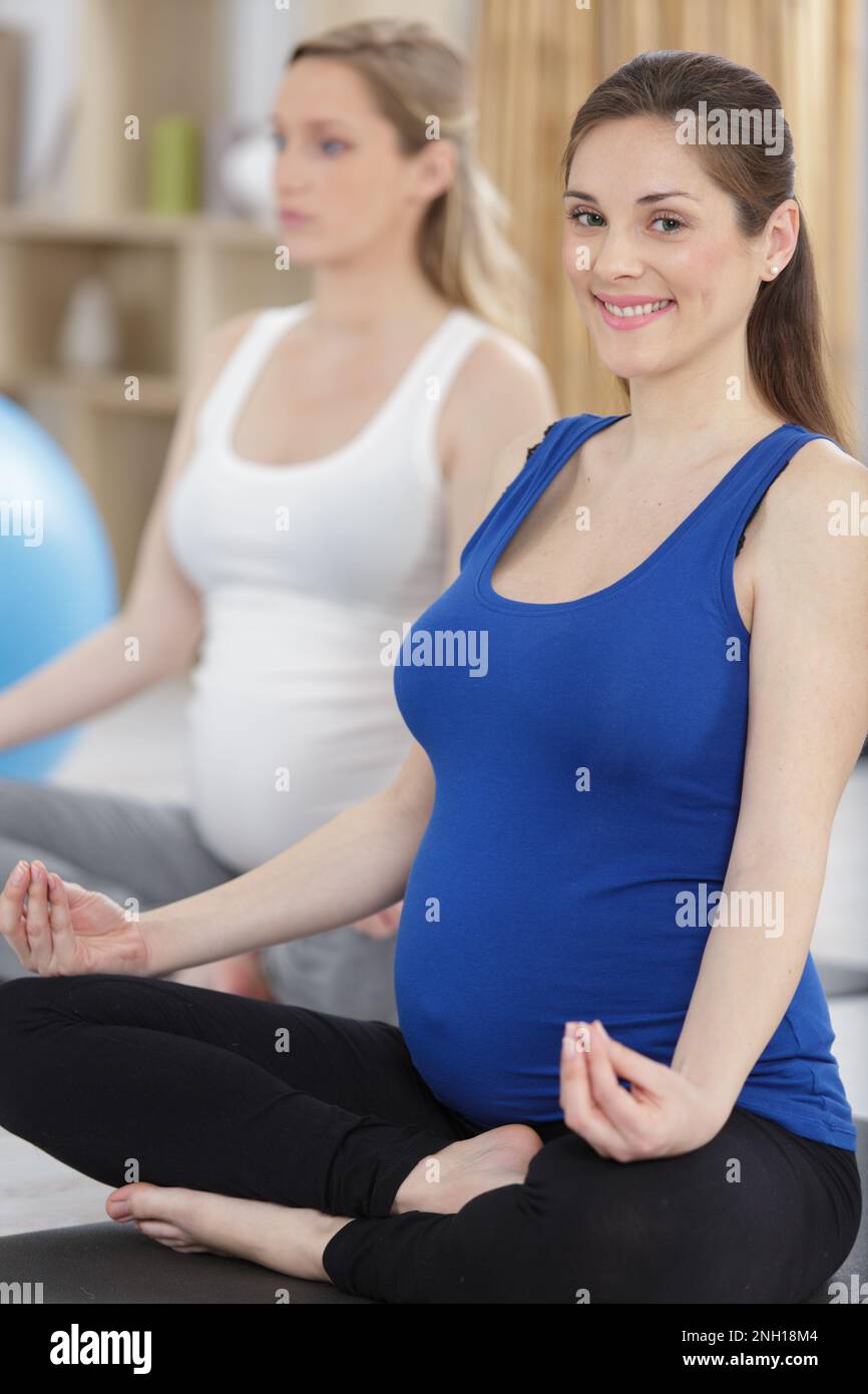 Group of pregnant women exercising hi-res stock photography and images ...