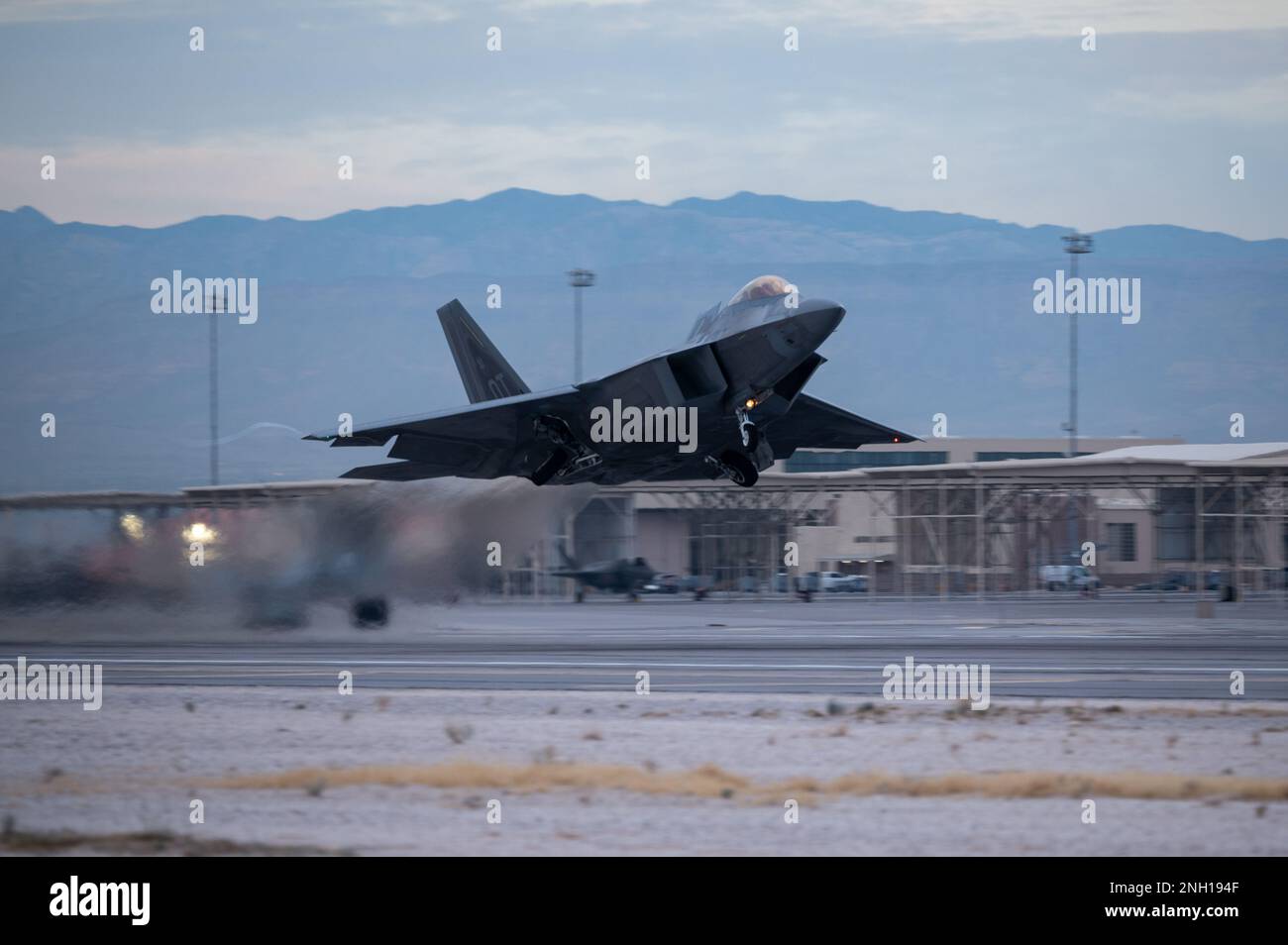 An F-22 Raptor, assigned to the 422nd Test and Evaluation Squadron ...