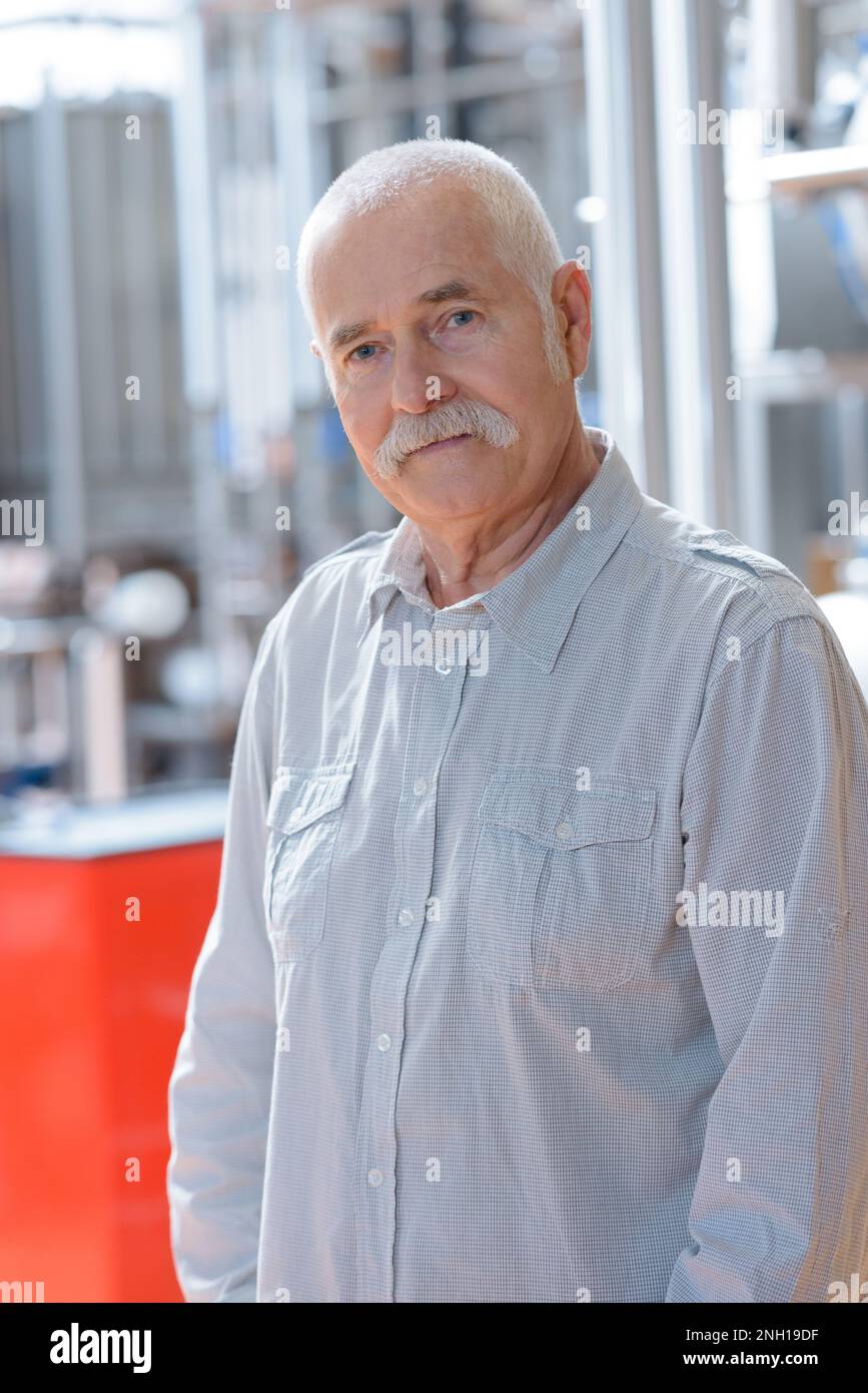 an owner of engineering factory Stock Photo - Alamy