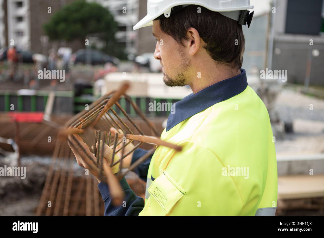 worker fixing steel rebar at building site Stock Photo - Alamy