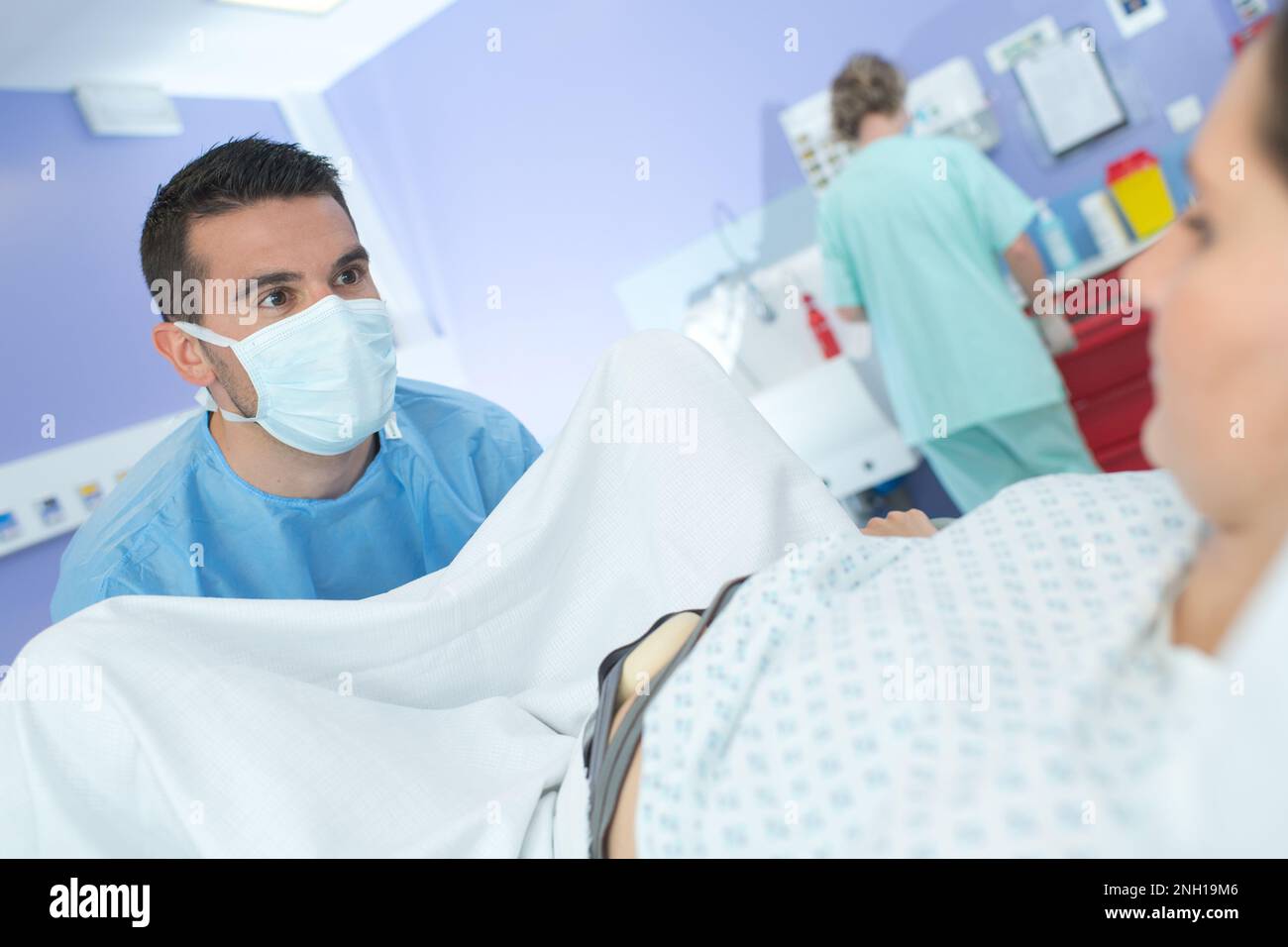 a preganant woman giving birth Stock Photo - Alamy