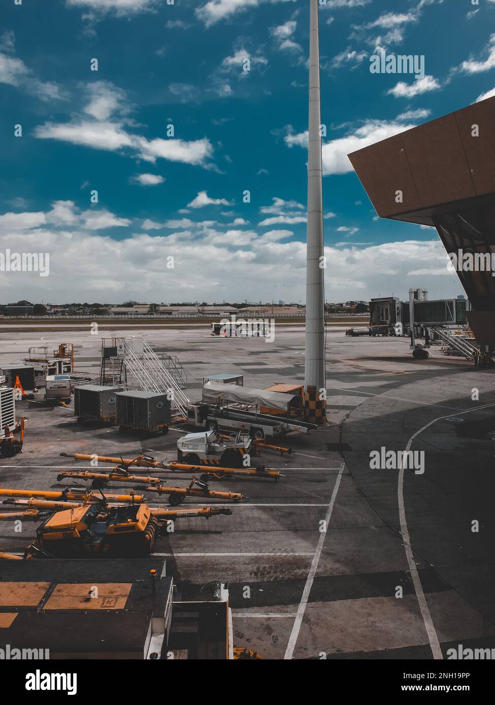 An aerial shot of an airport runway with no planes in sight, pristine ...