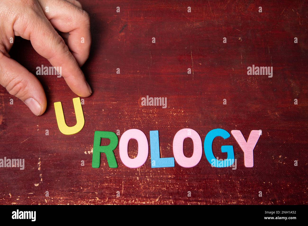 UROLOGY. Text from colorful alphabet letters on wooden background Stock ...