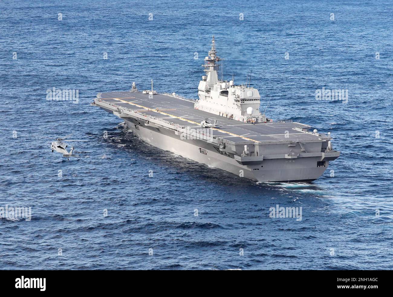 221206-N-FO714-1076 PHILIPPINE SEA (Dec. 6, 2022) An MH-60R Sea Hawk ...