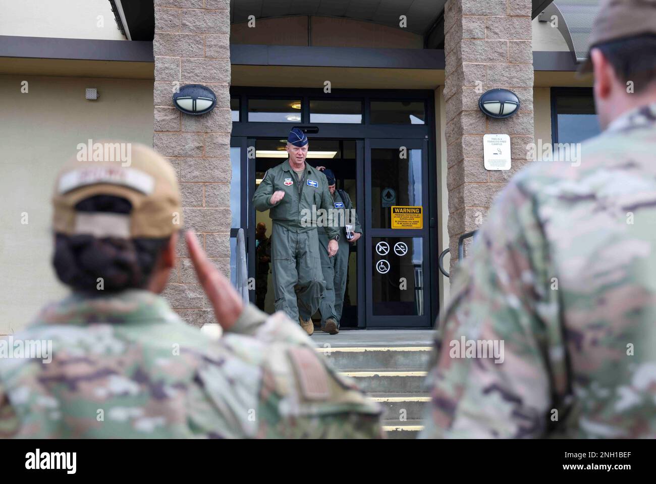 Airmen with the 9th Reconnaissance Wing salute U.S. Air Force Gen. Mark ...