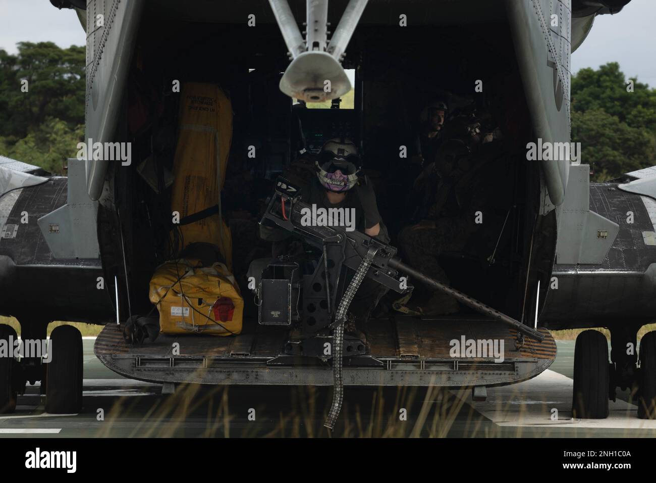 U.S. Marines with 1st Battalion, 2nd Marines prepare to board a CH-53E ...