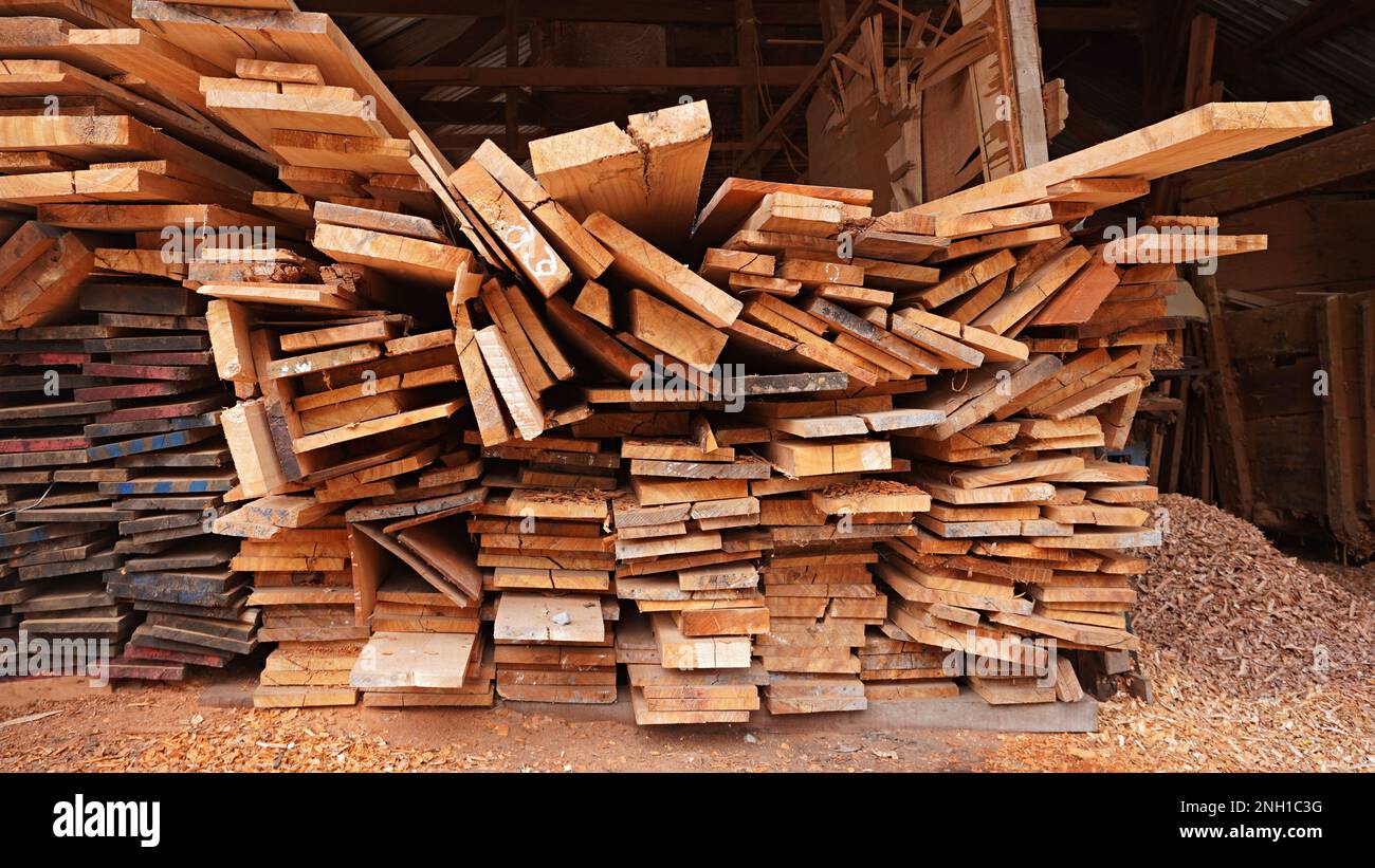 Arrangement stack of wooden planks block at a furniture craftsman's ...