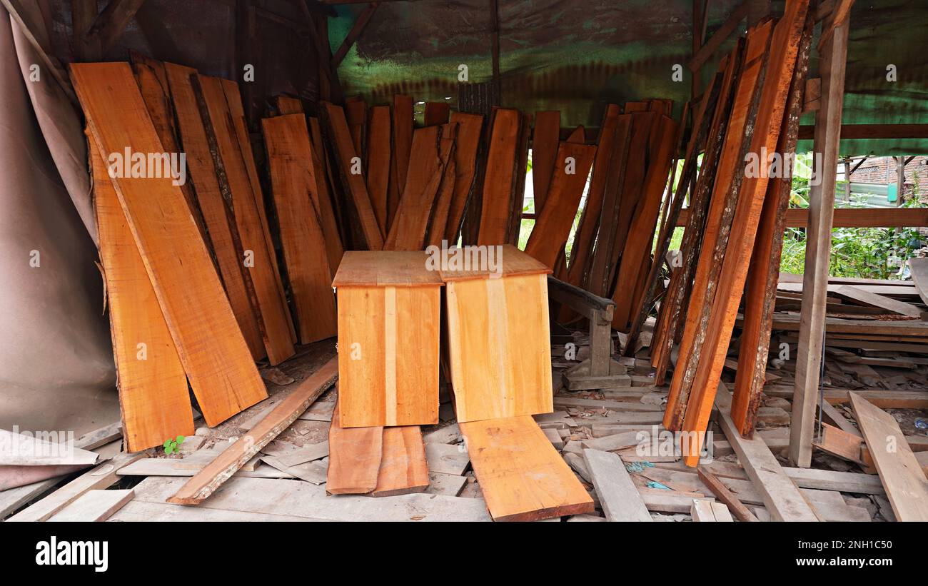 Arrangement stack of wooden planks block at a furniture craftsman's ...