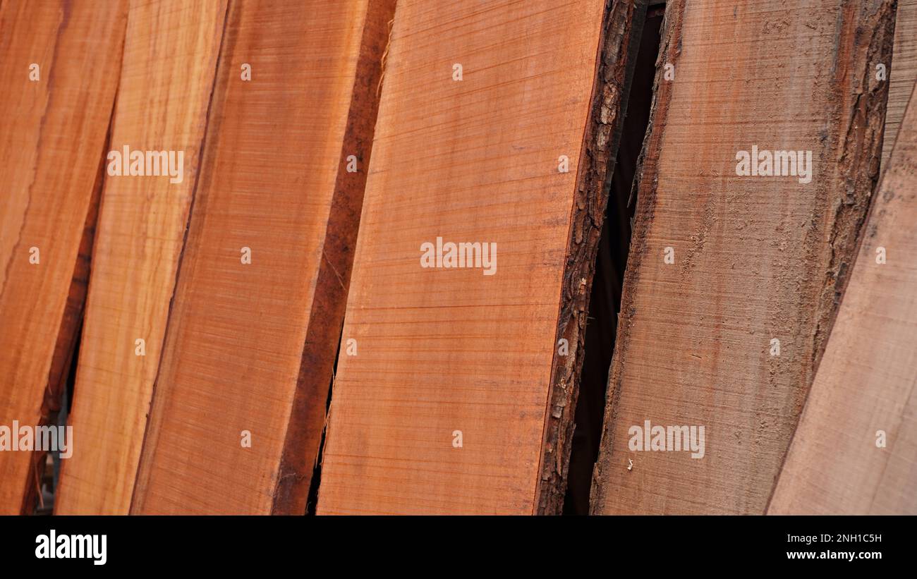 Arrangement stack of wooden planks block at a furniture craftsman's ...