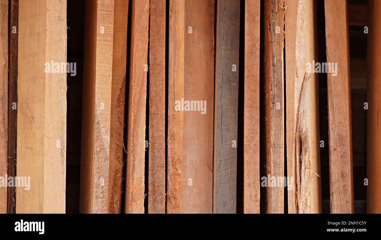 Arrangement stack of wooden planks block at a furniture craftsman's ...
