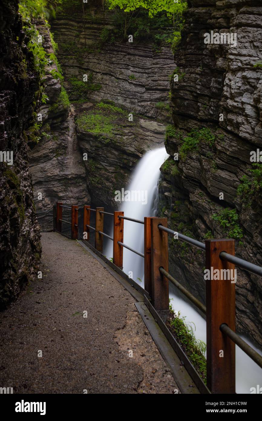 A built hiking trail leading to a waterfall Stock Photo - Alamy
