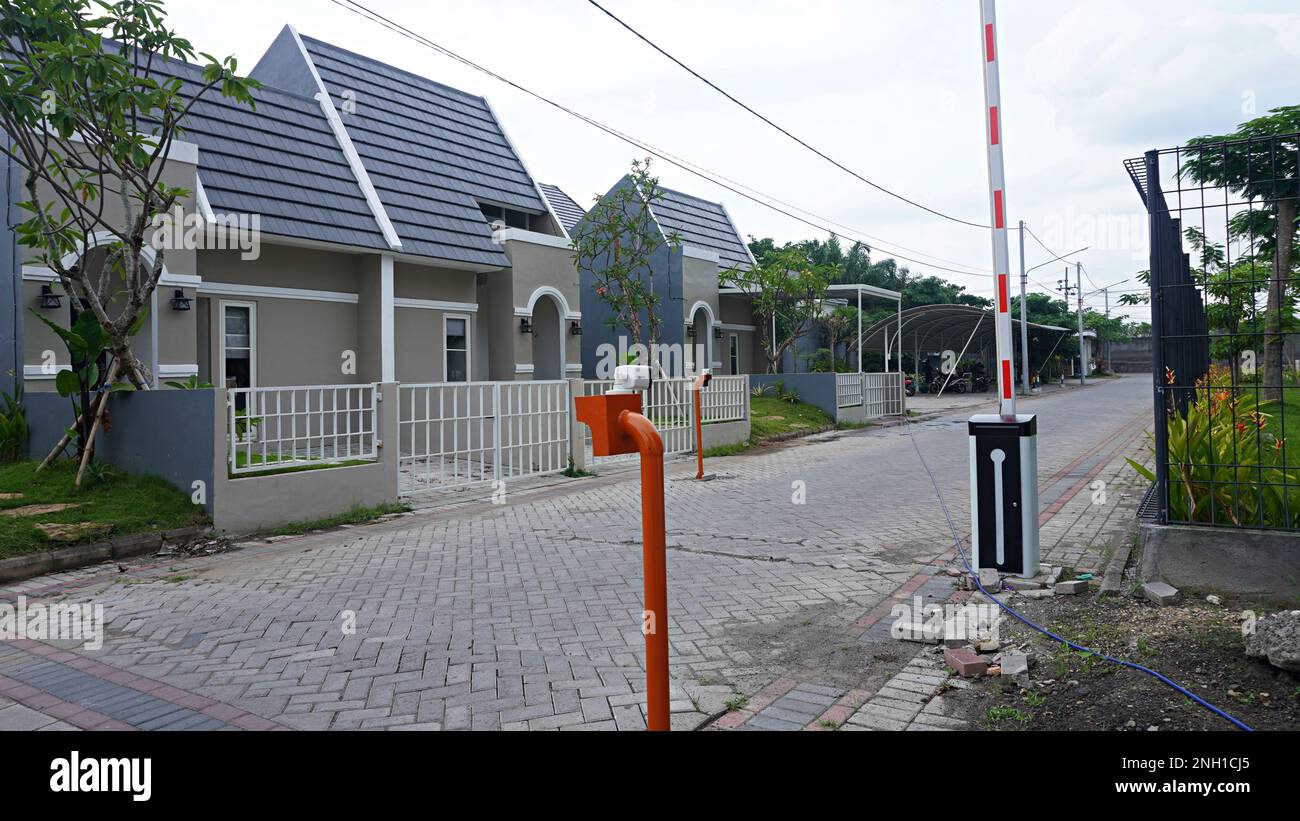 cctv Infront of a modern of house building surrounded by trees at ...