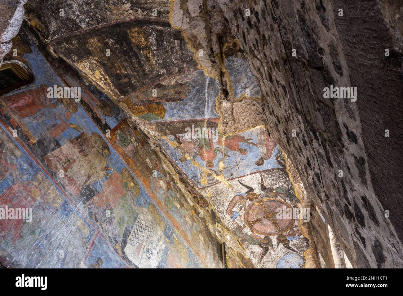 Church of Dormition with colorful medieval frescos in Vardzia cave ...