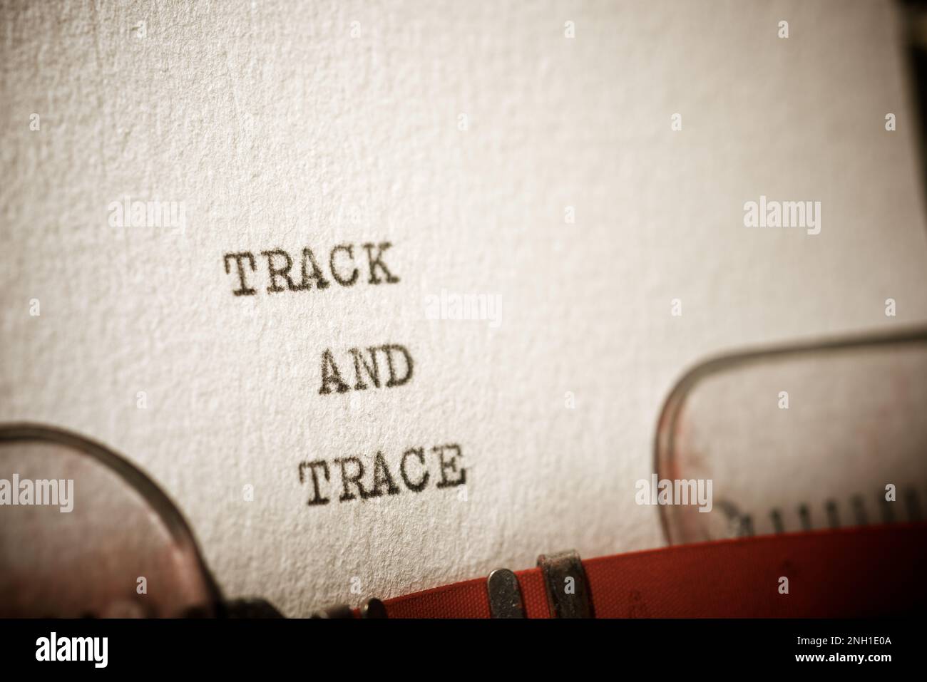 Track and trace text written with a typewriter Stock Photo - Alamy